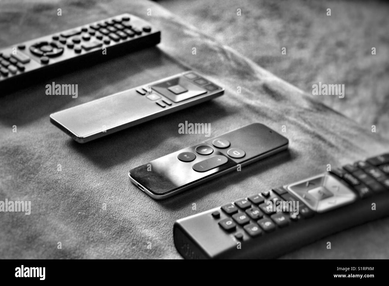 Remotes line up ready to use Stock Photo - Alamy