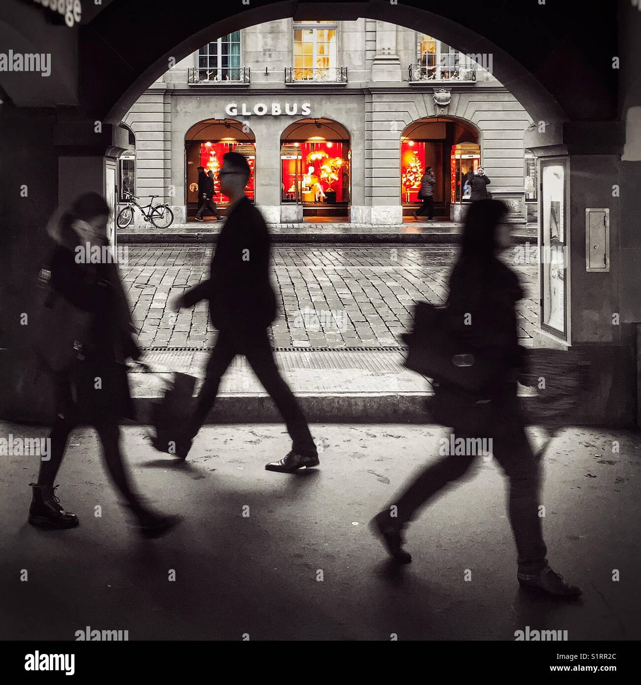 Shoppers rushing through the shopping arcades of Bern, Switzerland ...