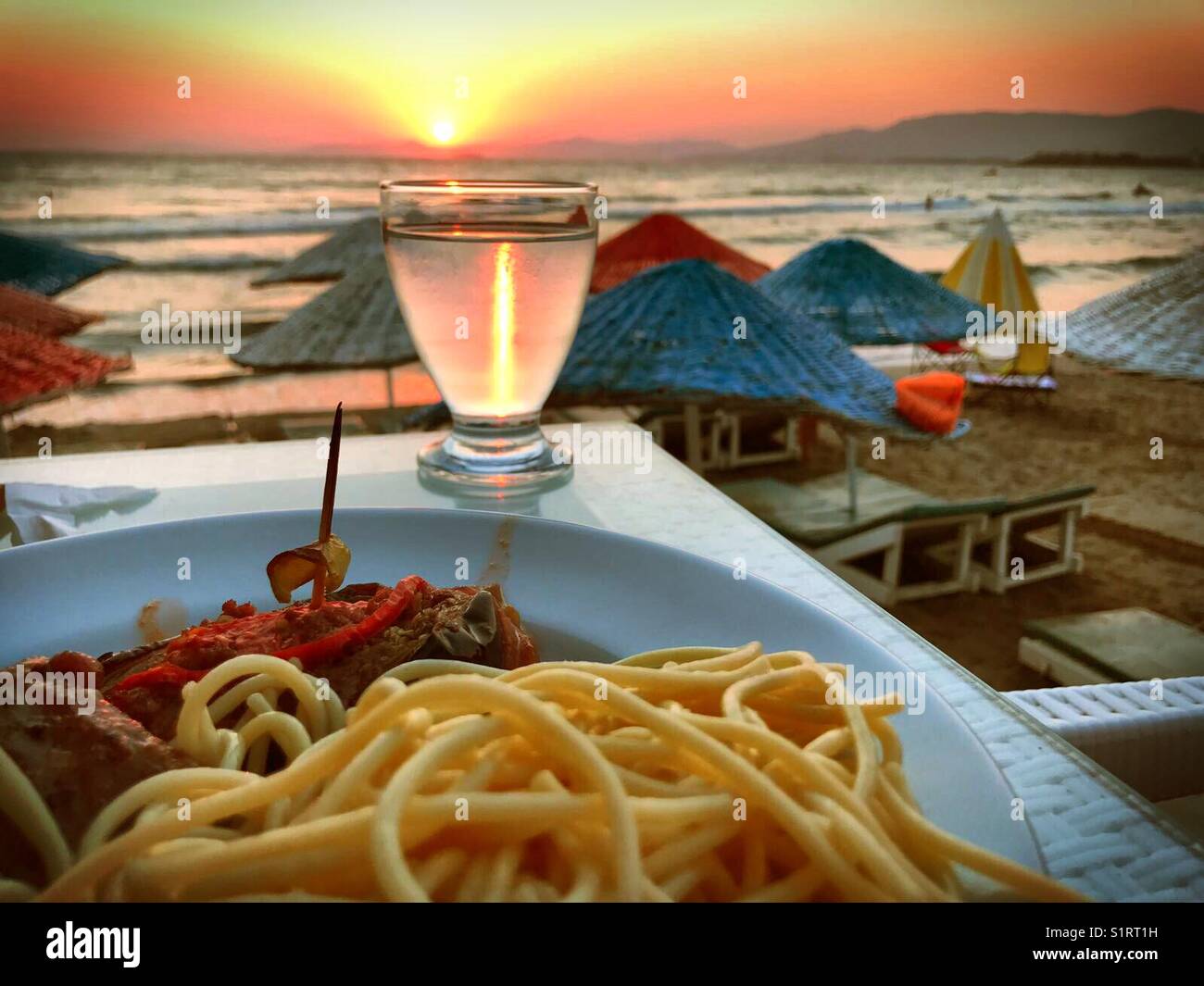 Dinner at sunset Stock Photo - Alamy
