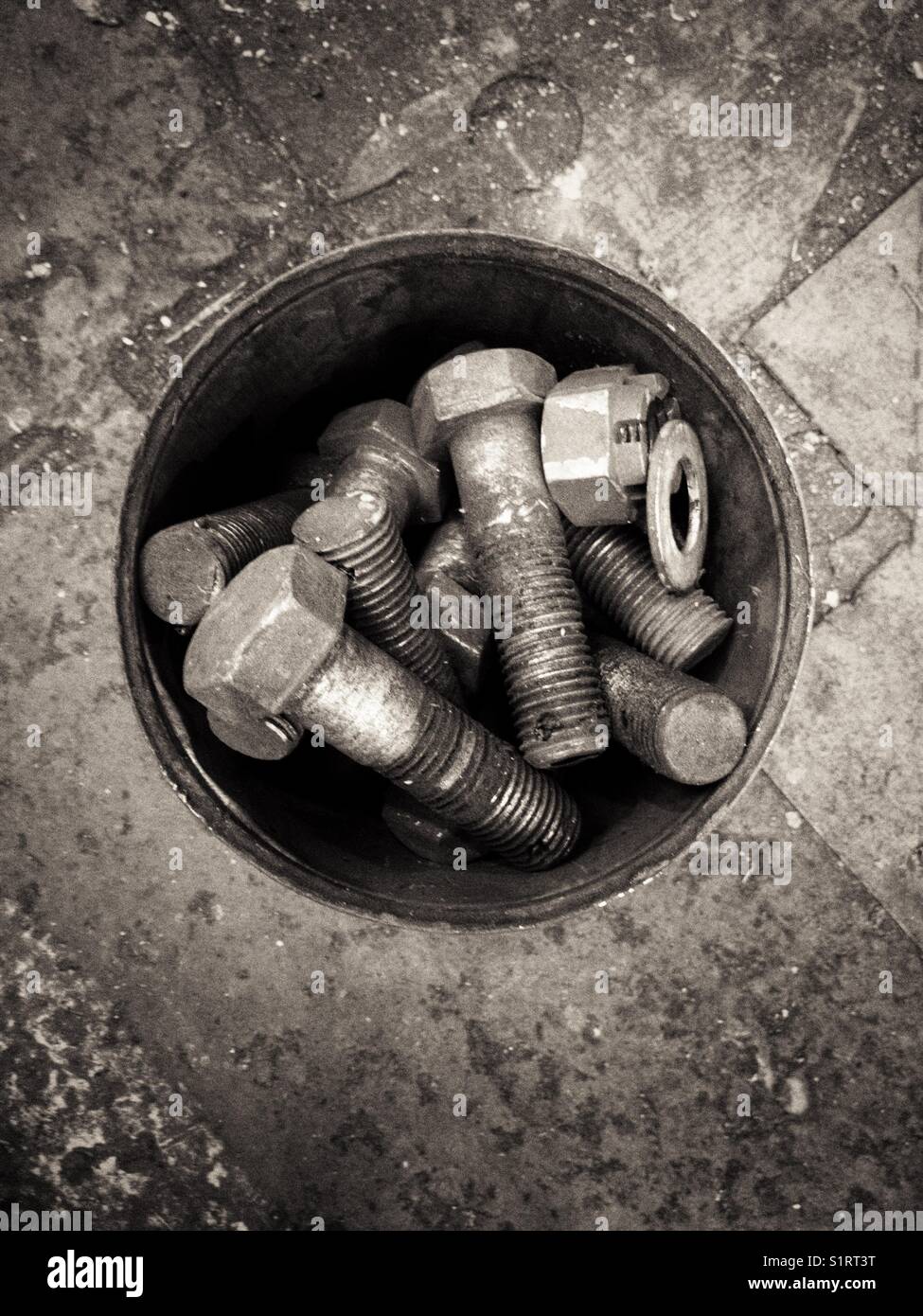 Bucket with screws Stock Photo - Alamy