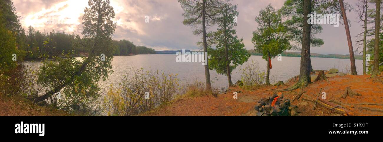 Fall Lake With Campfire At Forest Panorama Stock Photo - Alamy