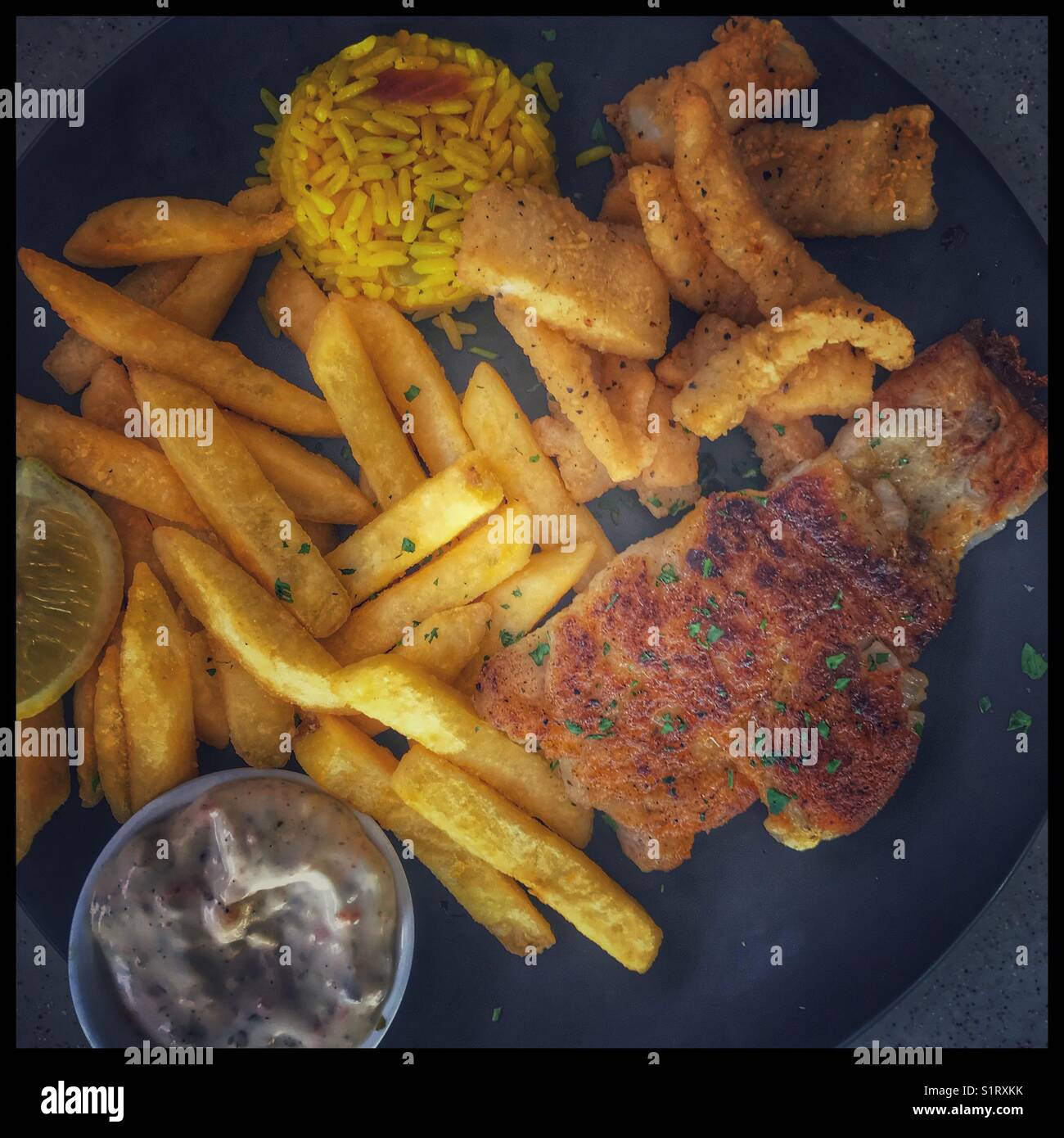 Fish and chips and calamari Stock Photo - Alamy