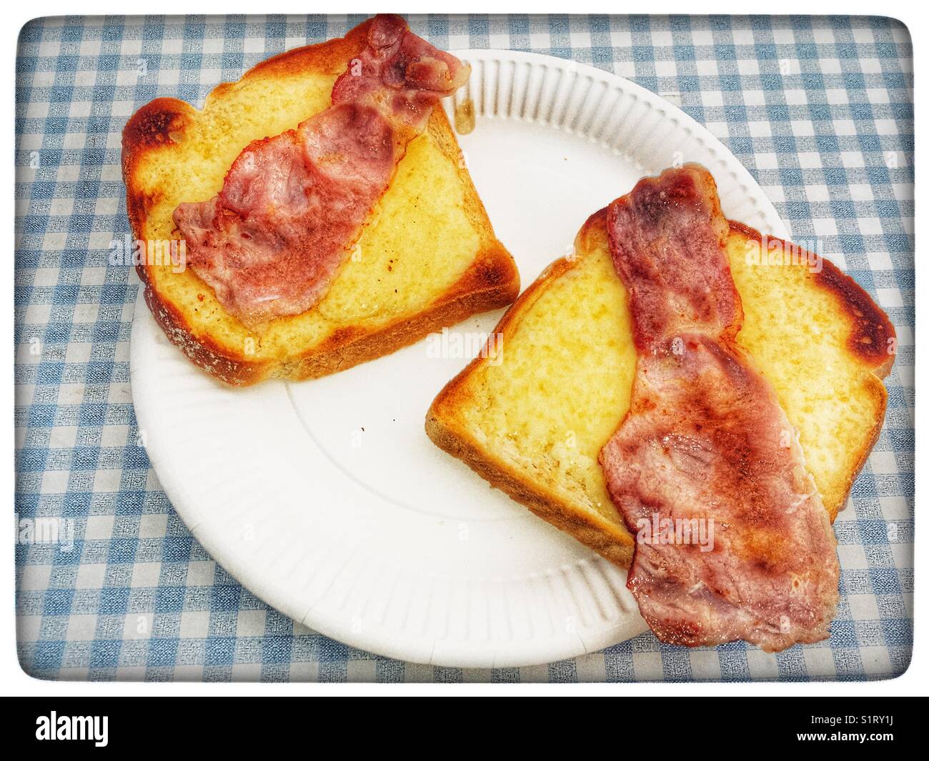 Grilled cheese on toast with rashes of bacon Stock Photo - Alamy