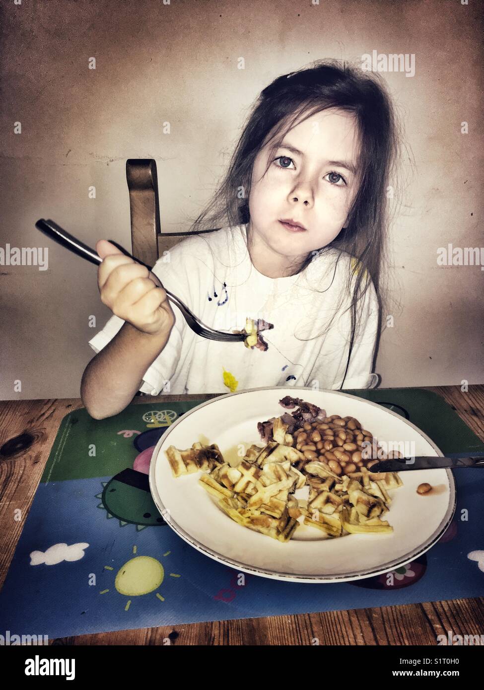 Girl eating baked beans hi-res stock photography and images - Alamy
