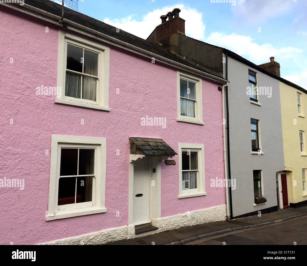 A terrace of pastel coloured cottages in Cawsand Kingsand, southeast ...