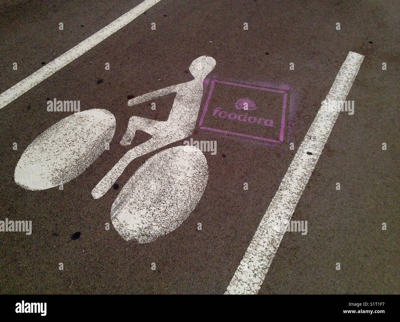 Pictogram and publicity on a Bike path in Montpellier France Stock ...