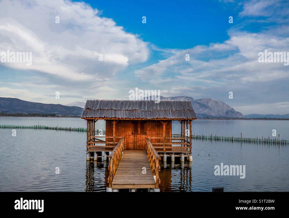 Walking by the lake of Mesologgi Stock Photo - Alamy