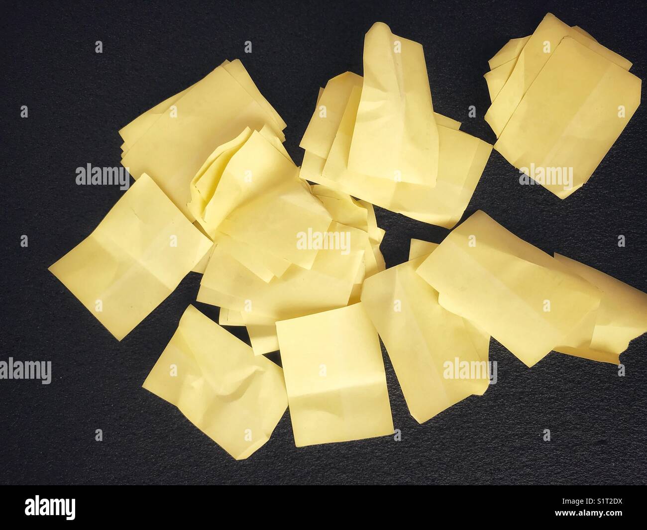 A bunch of sticky notes on a black surface Stock Photo - Alamy