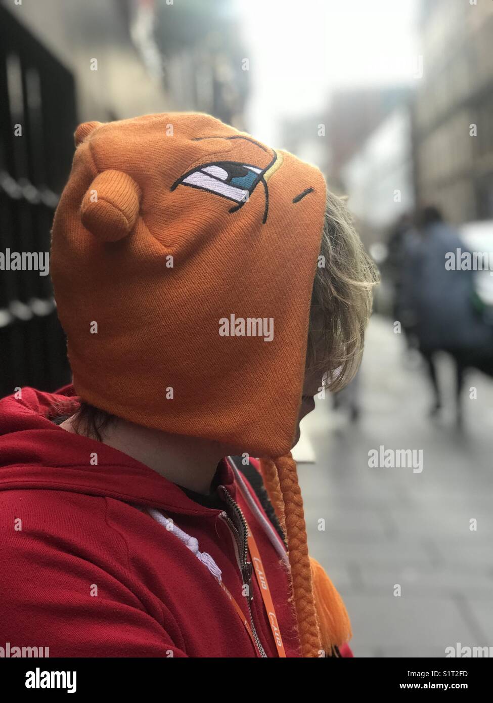 Teenage boy in Glasgow with Pokemon hat on Stock Photo - Alamy