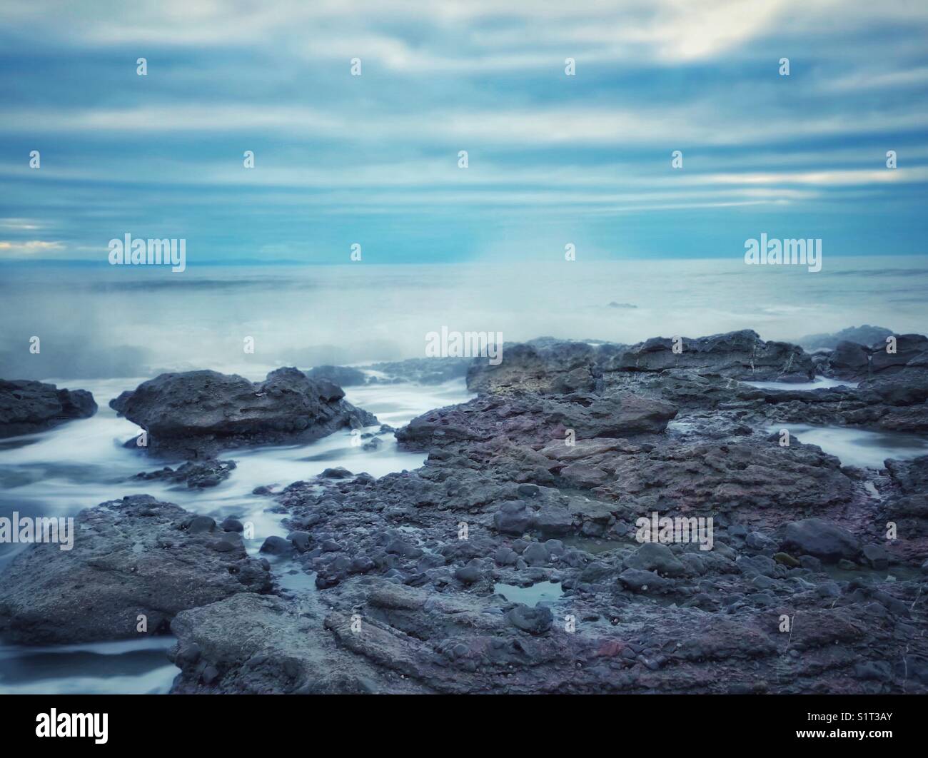 Blue welsh surf Stock Photo - Alamy