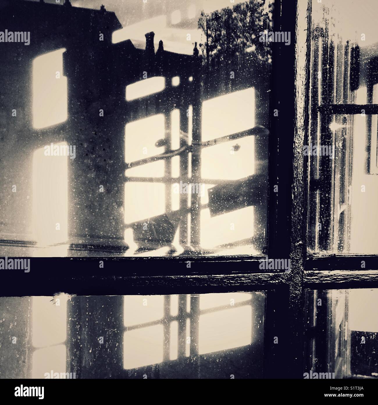 Shadows through the window Stock Photo - Alamy