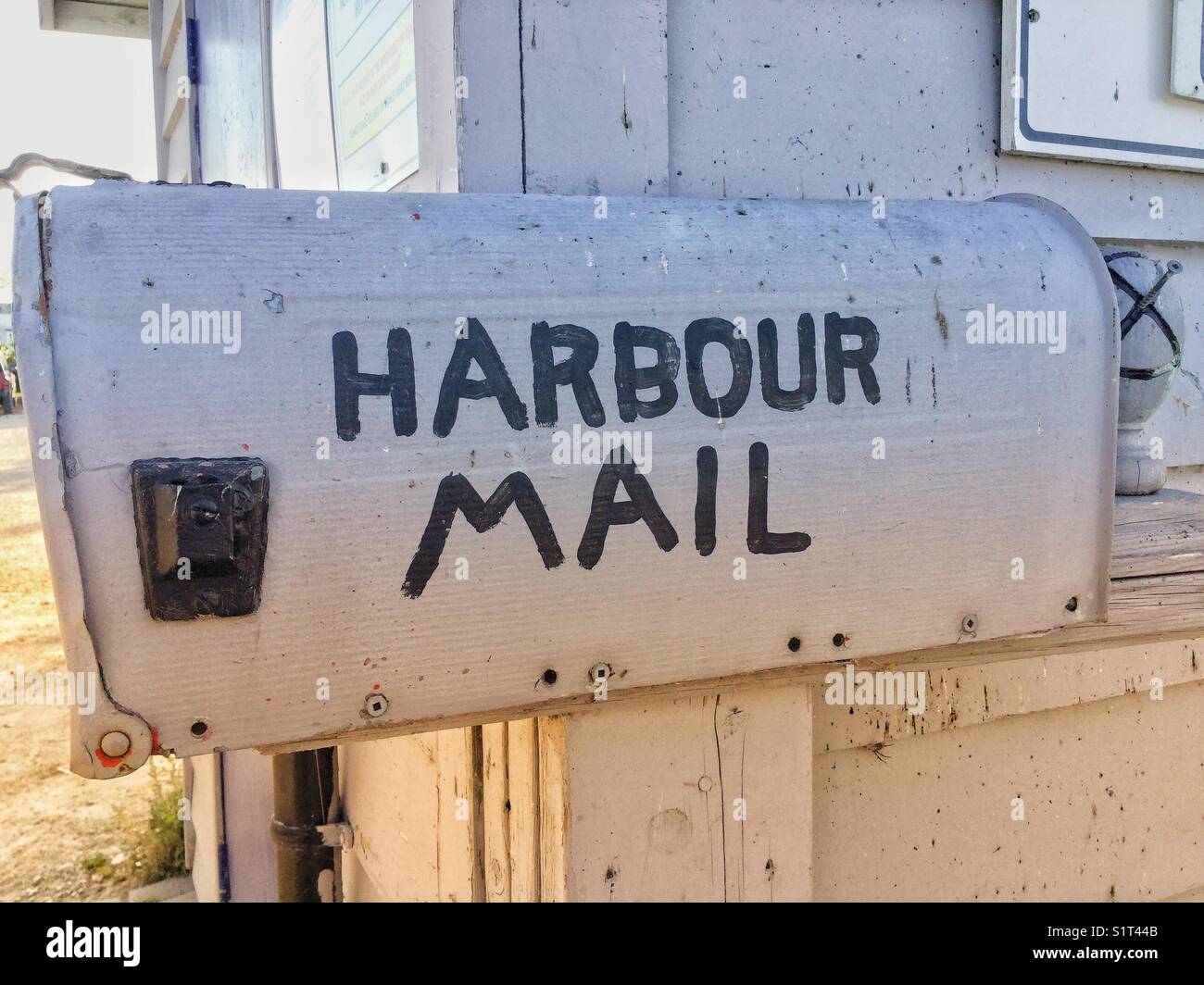 Old fashioned white mail box Stock Photo - Alamy
