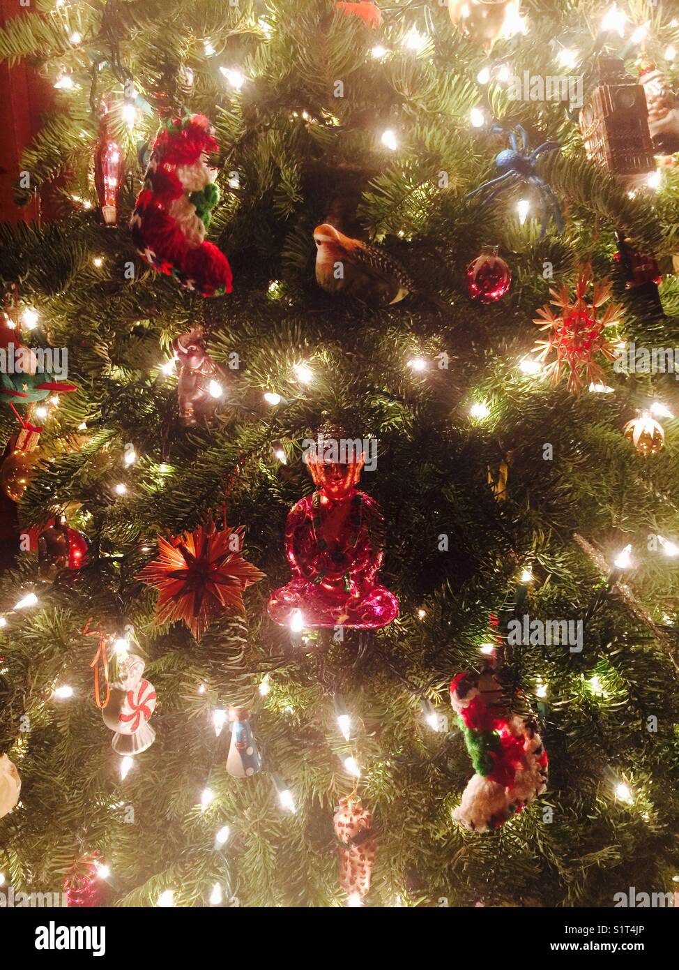 Christmas tree with Buddha Stock Photo - Alamy