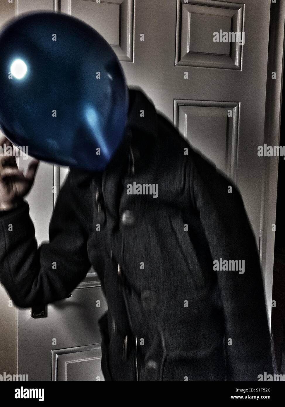 Blue/balloon man walking into the room Stock Photo - Alamy