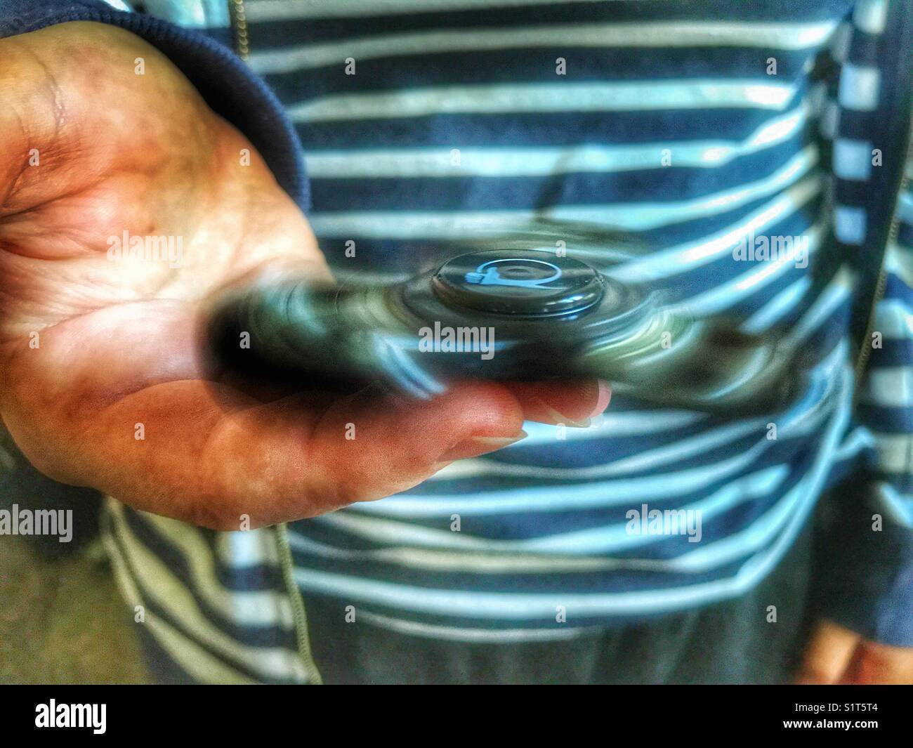 Fidgeting hand hi-res stock photography and images - Alamy