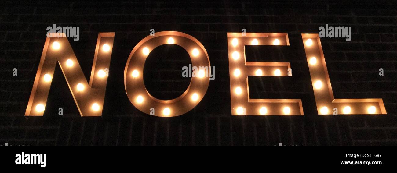 Noel in bright neon lights Stock Photo - Alamy