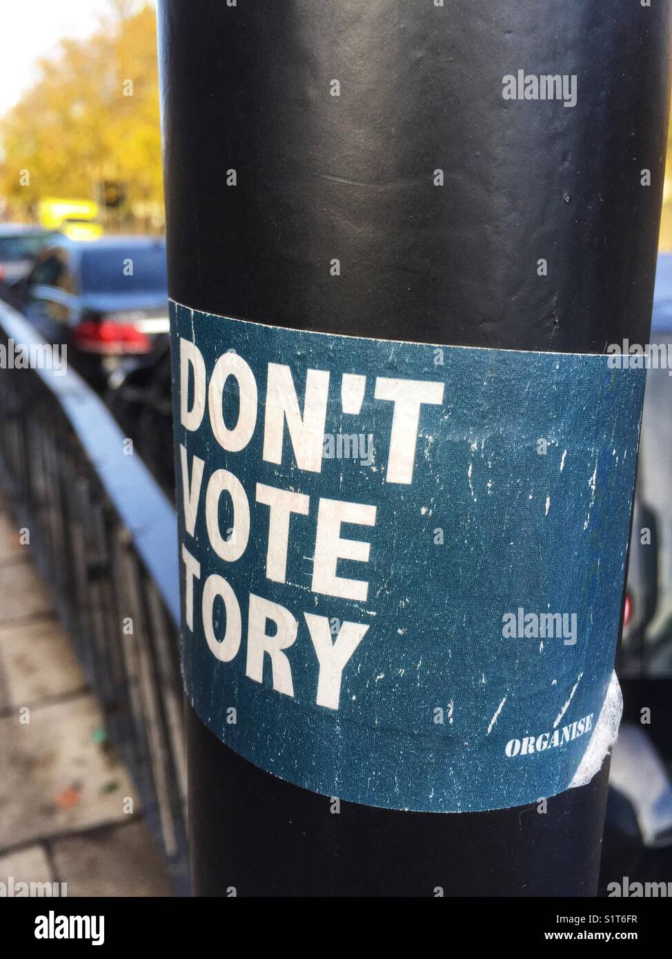 A 'Don't vote Tory' sticker on a lamppost in Archway in London, England ...