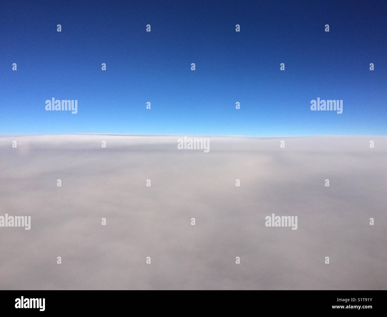 Blue and white view from a plane Stock Photo - Alamy