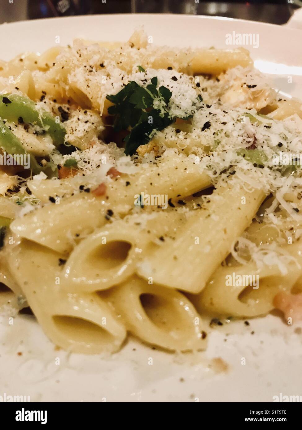 Cheesy penne pasta Stock Photo - Alamy