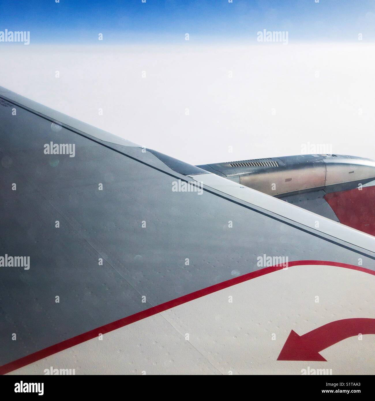 Red arrow on aircraft wing Stock Photo - Alamy