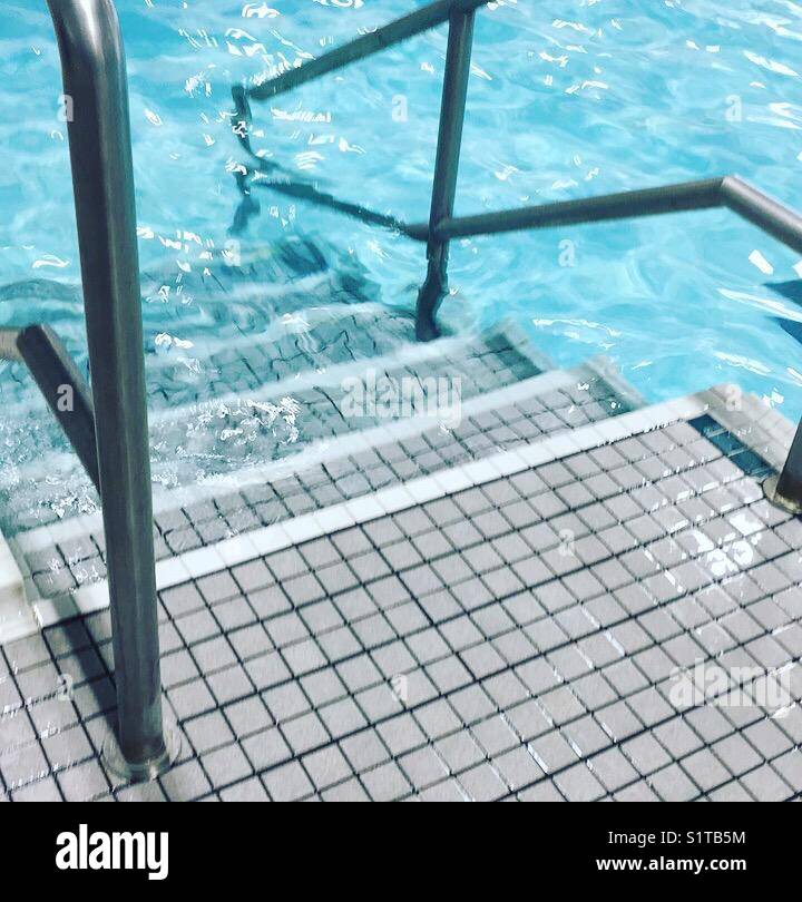 Entering swimming pool hi-res stock photography and images - Alamy