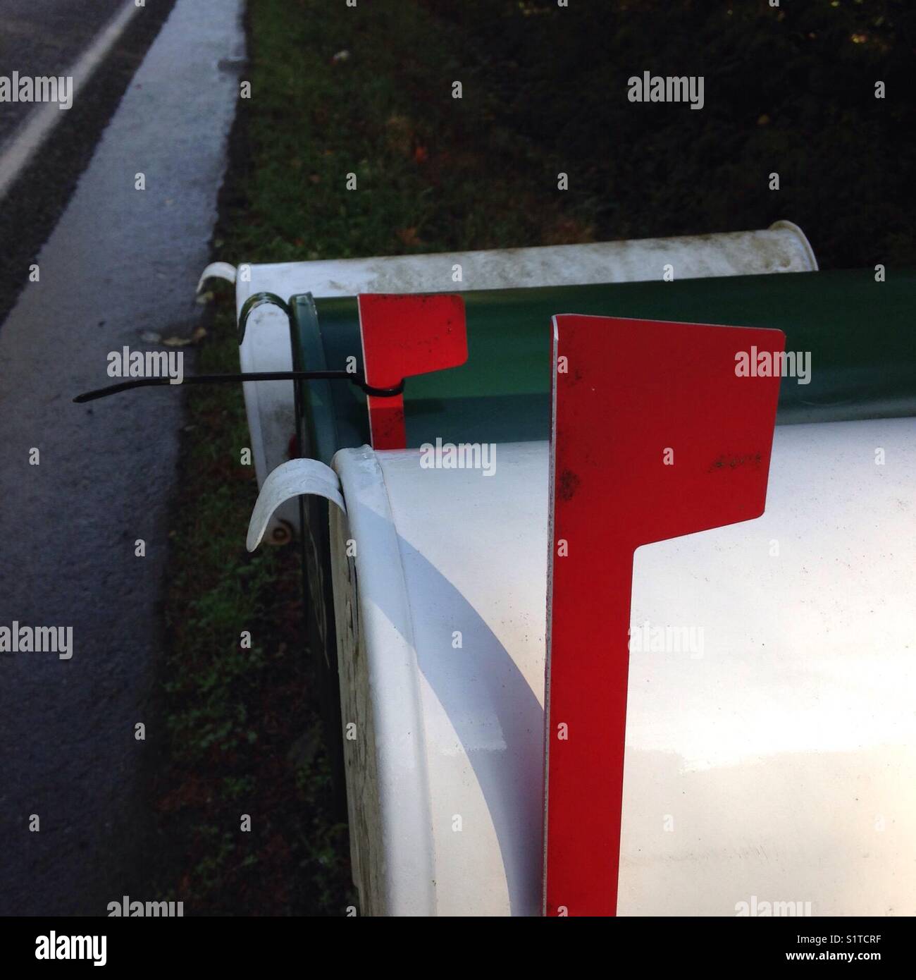 Three rural mailboxes - two flags up Stock Photo - Alamy