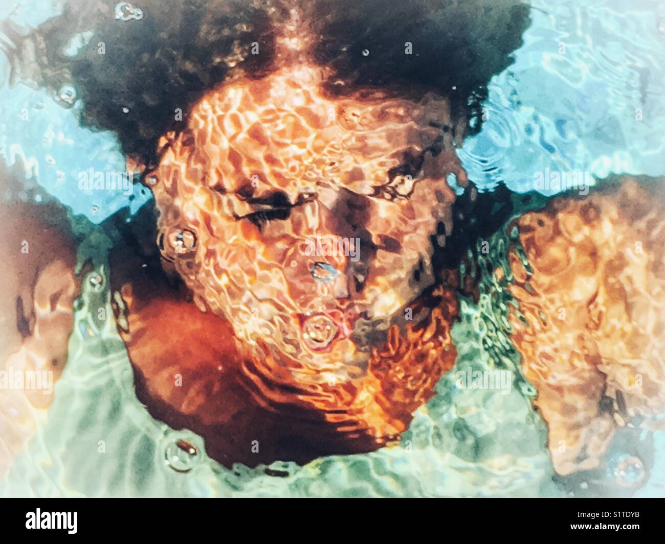 Person underwater in pool hi-res stock photography and images - Alamy