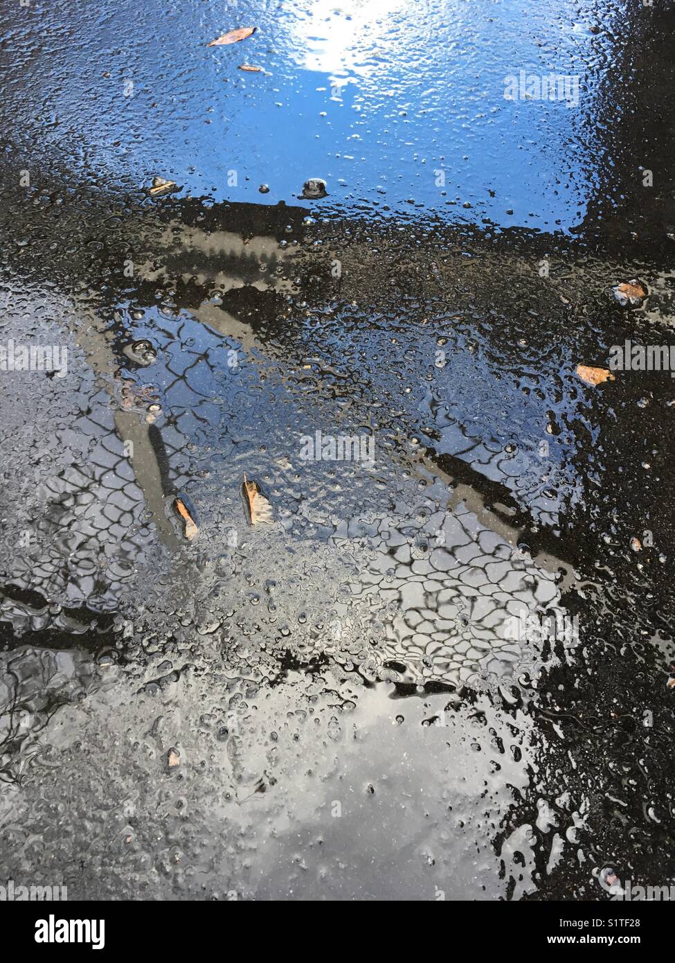 Blue puddle hi-res stock photography and images - Alamy