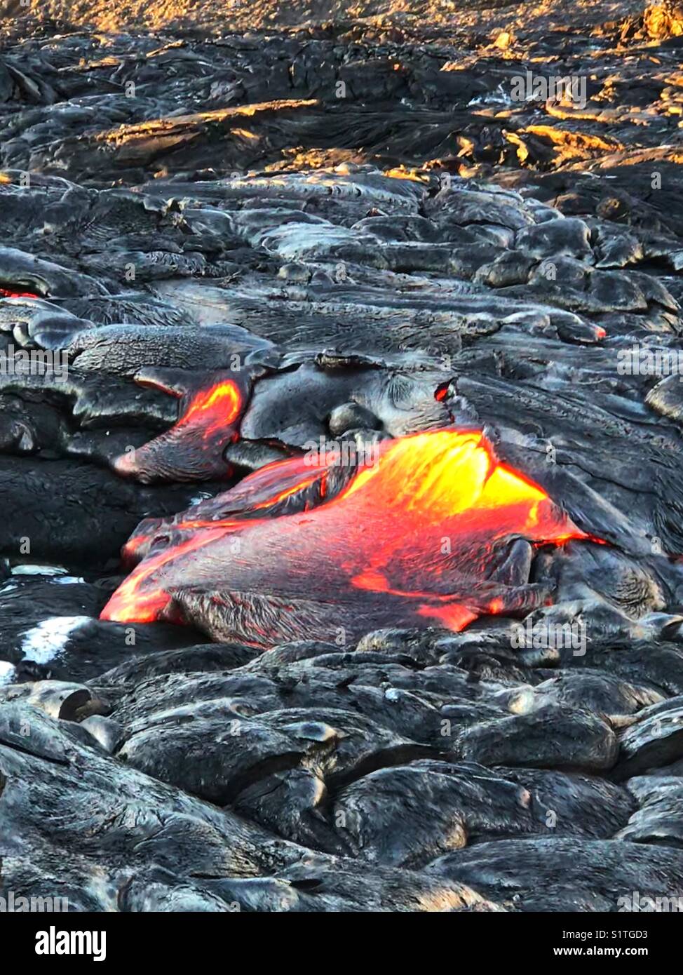 Flowing lava hi-res stock photography and images - Alamy
