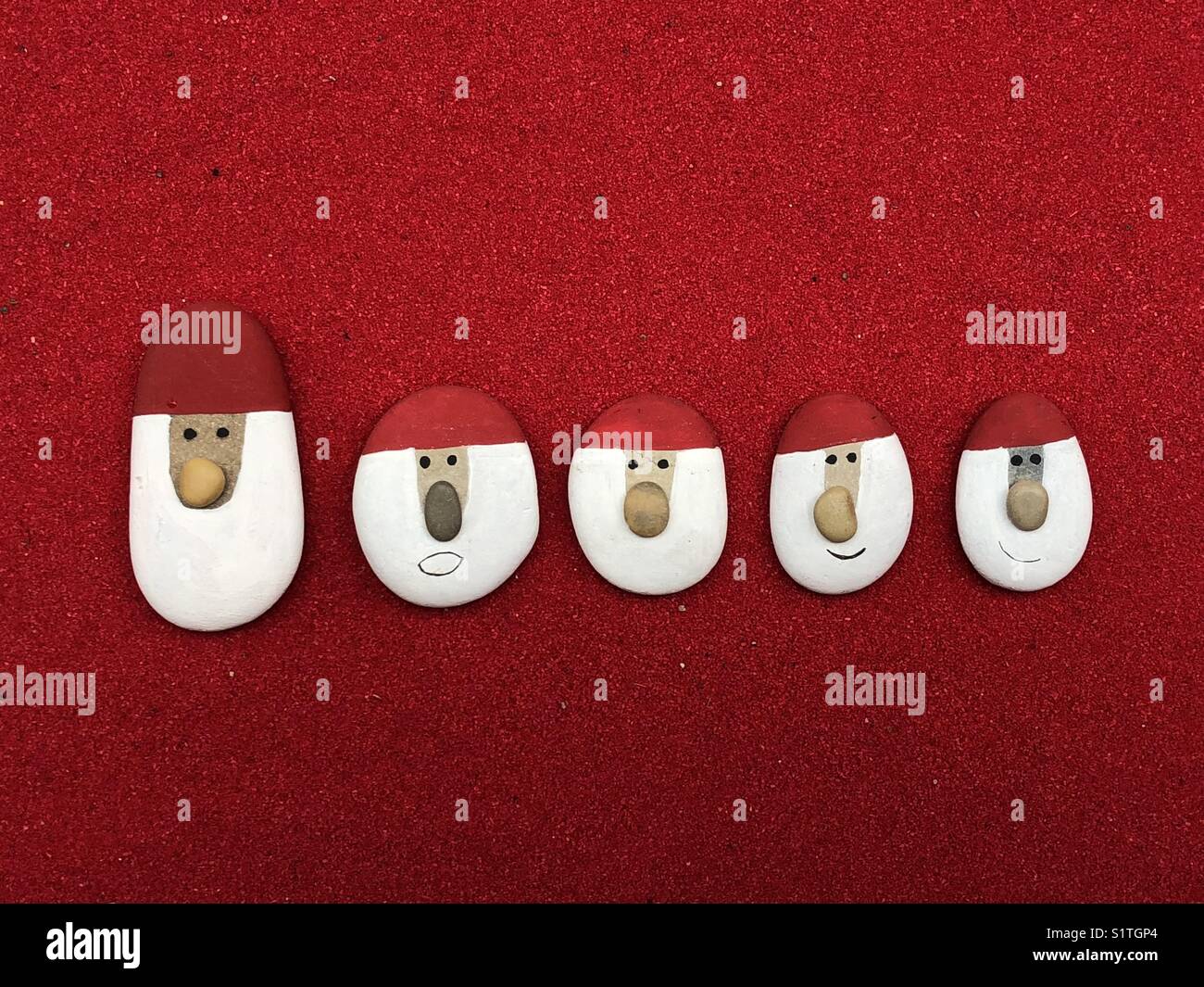 Santa heads hi-res stock photography and images - Alamy