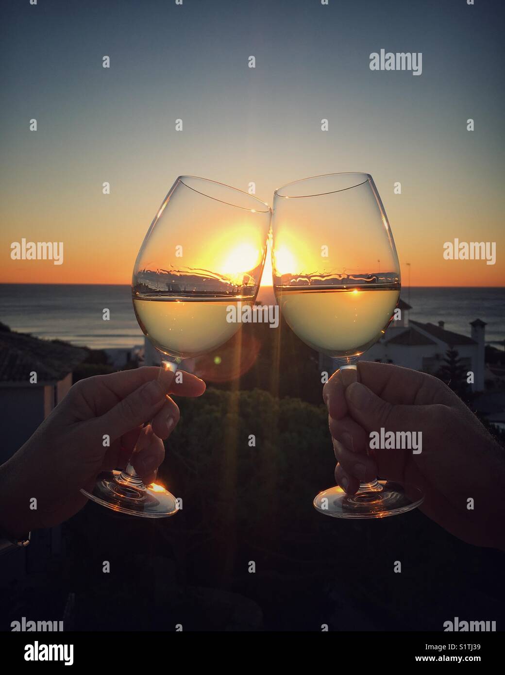 Wine Glasses Clinking Stock Photos & Wine Glasses Clinking Stock Images - Alamy