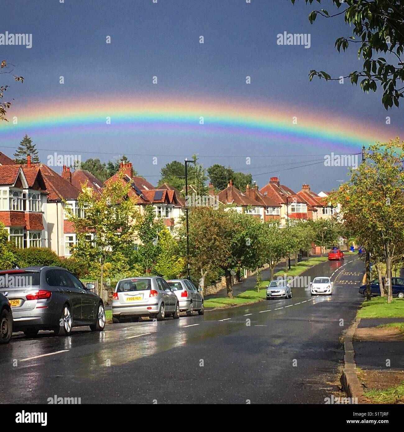 Rainbow over city hi-res stock photography and images - Alamy