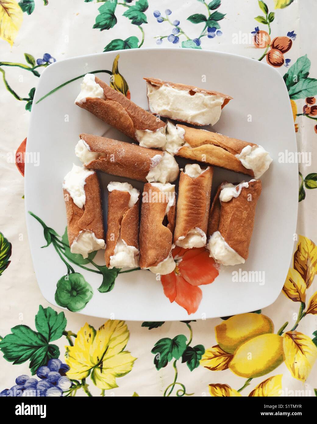 Cannoli on an Italian table Stock Photo - Alamy
