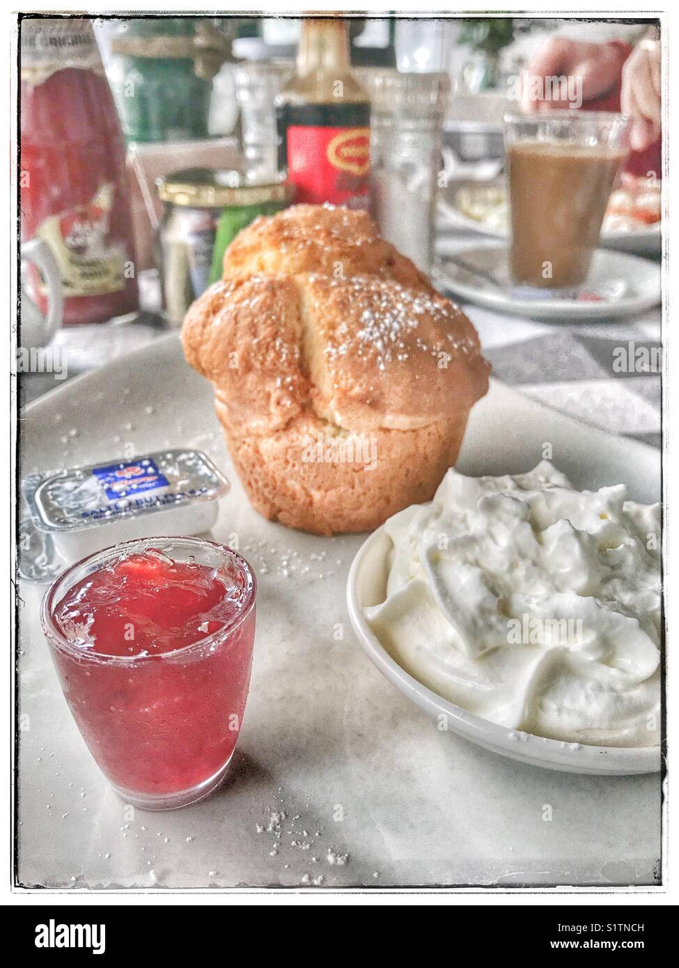 Scone with jam and cream Stock Photo - Alamy