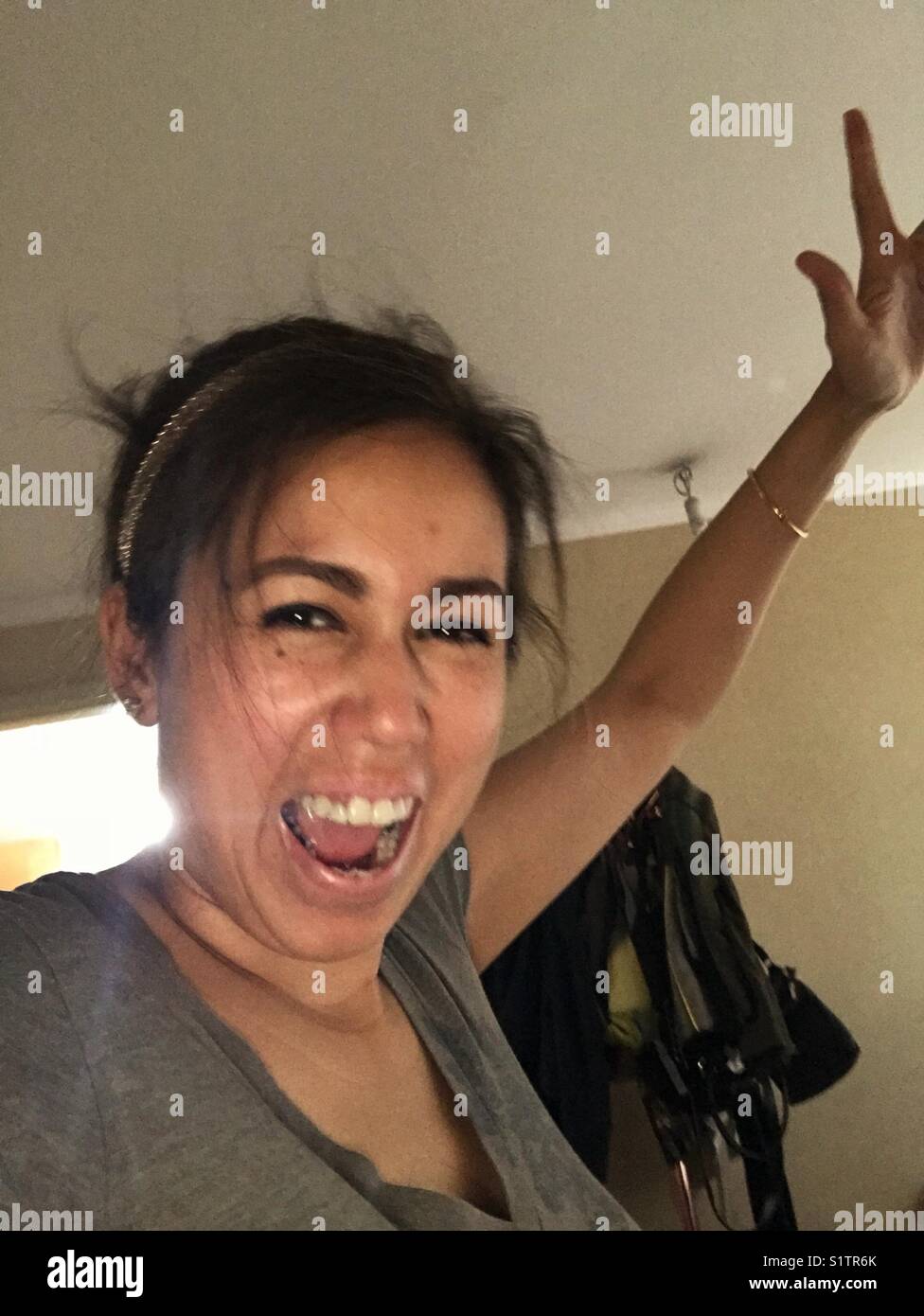 Woman victorious hi-res stock photography and images - Alamy