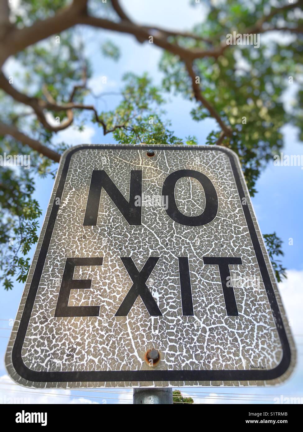 Sun damaged sign hi-res stock photography and images - Alamy