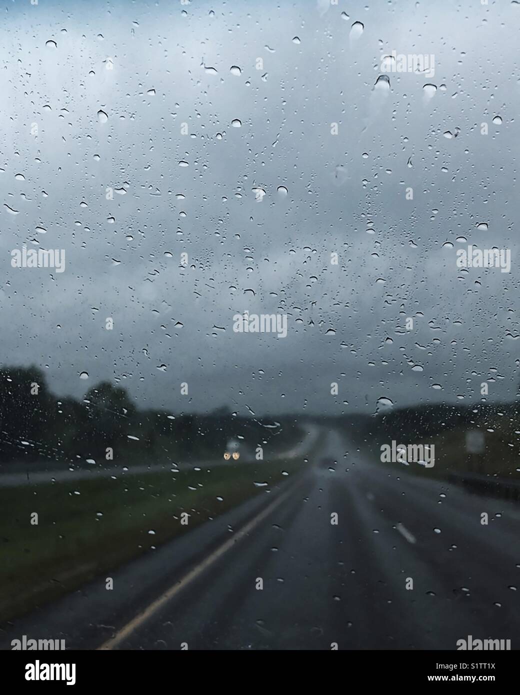 Rain on windshield Stock Photo - Alamy