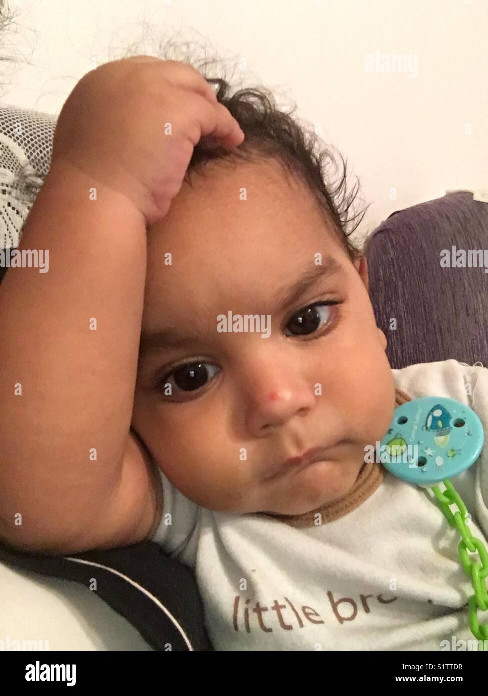 Sad baby hi-res stock photography and images - Alamy