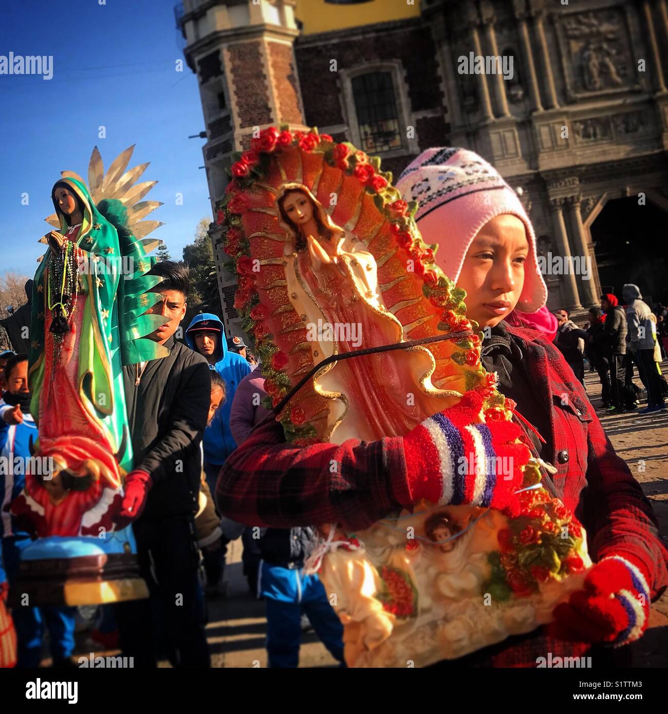 Pilgrims carry images of Our Lady of Guadalupe during the annual ...