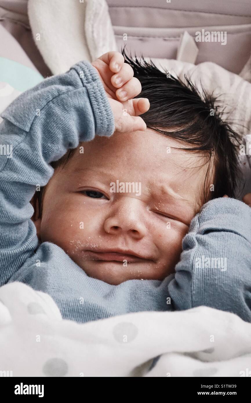 Waking up baby Stock Photo - Alamy