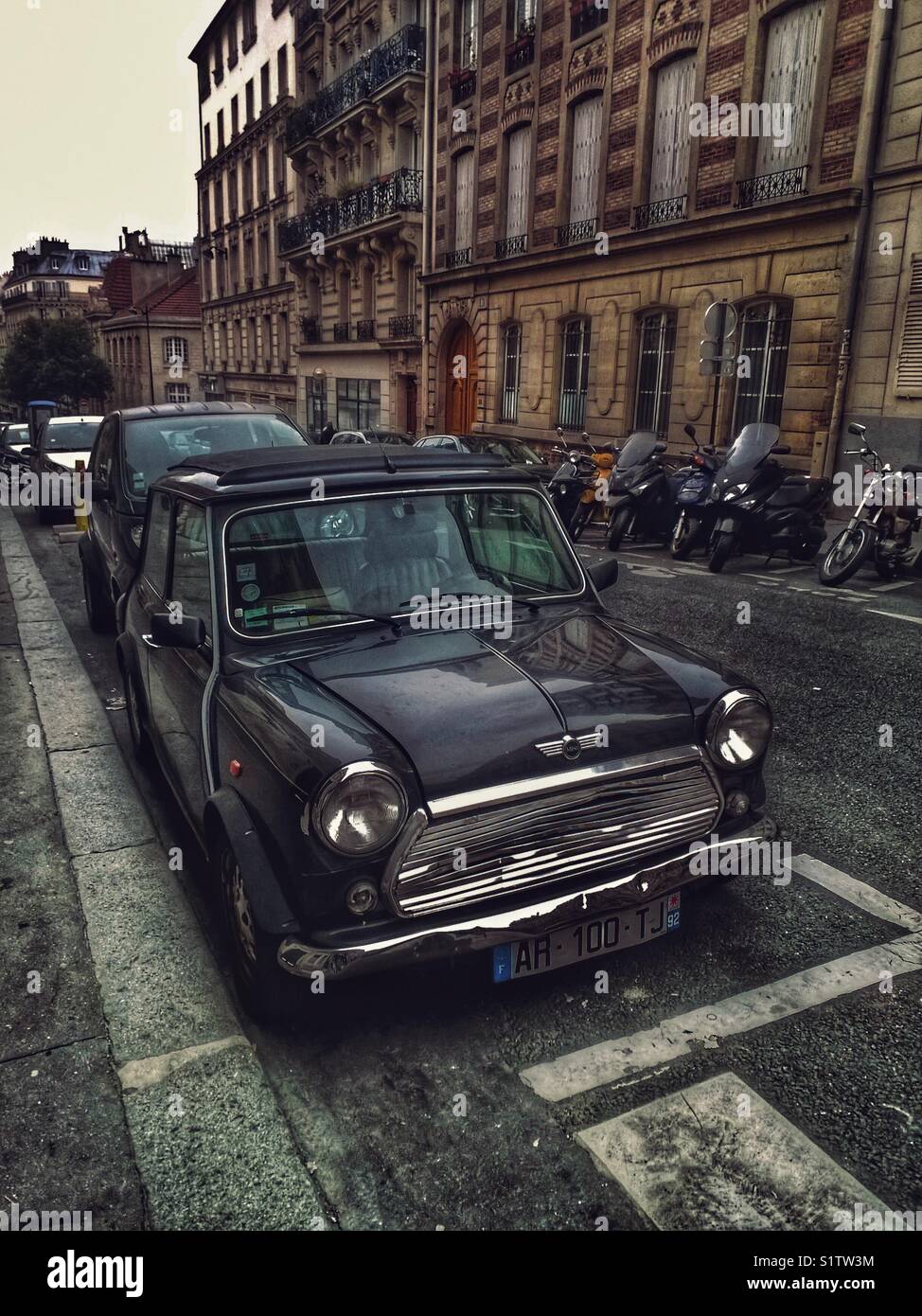 Mini Cooper parked on 9th arrondissement street in Paris, France Stock ...