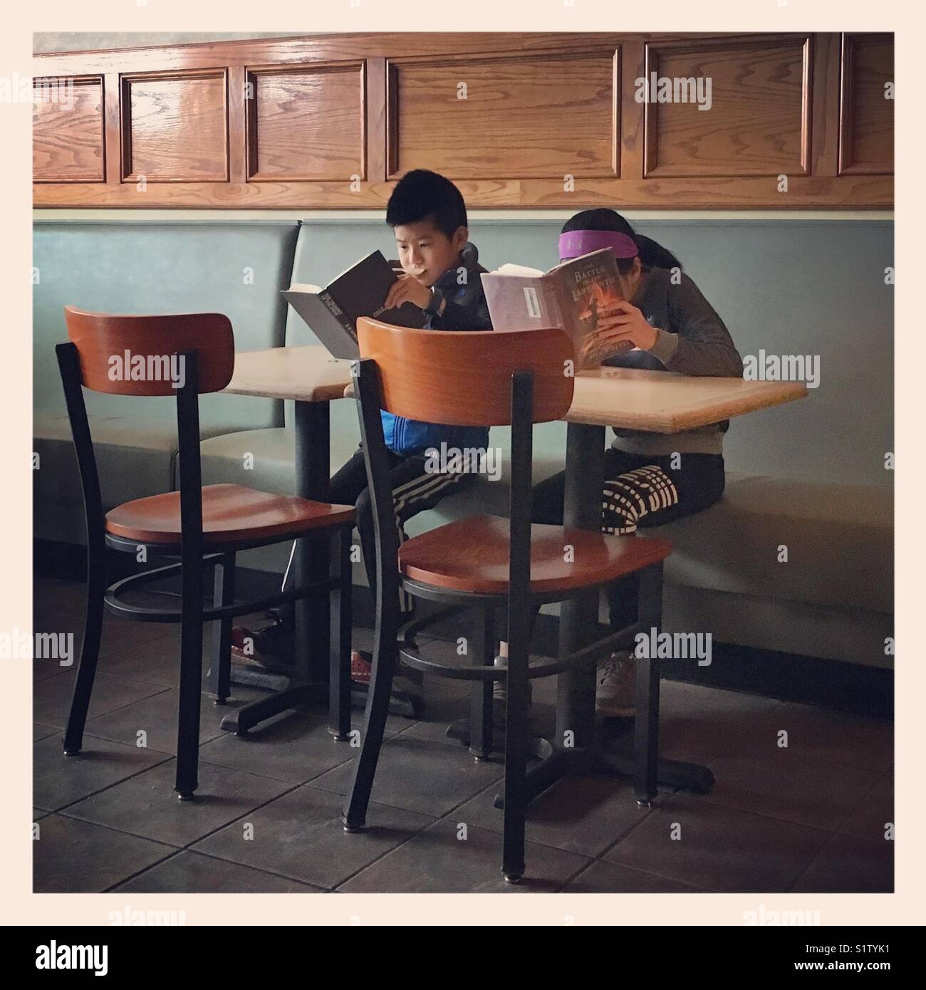 Children Reading Books Table High Resolution Stock Photography and ...
