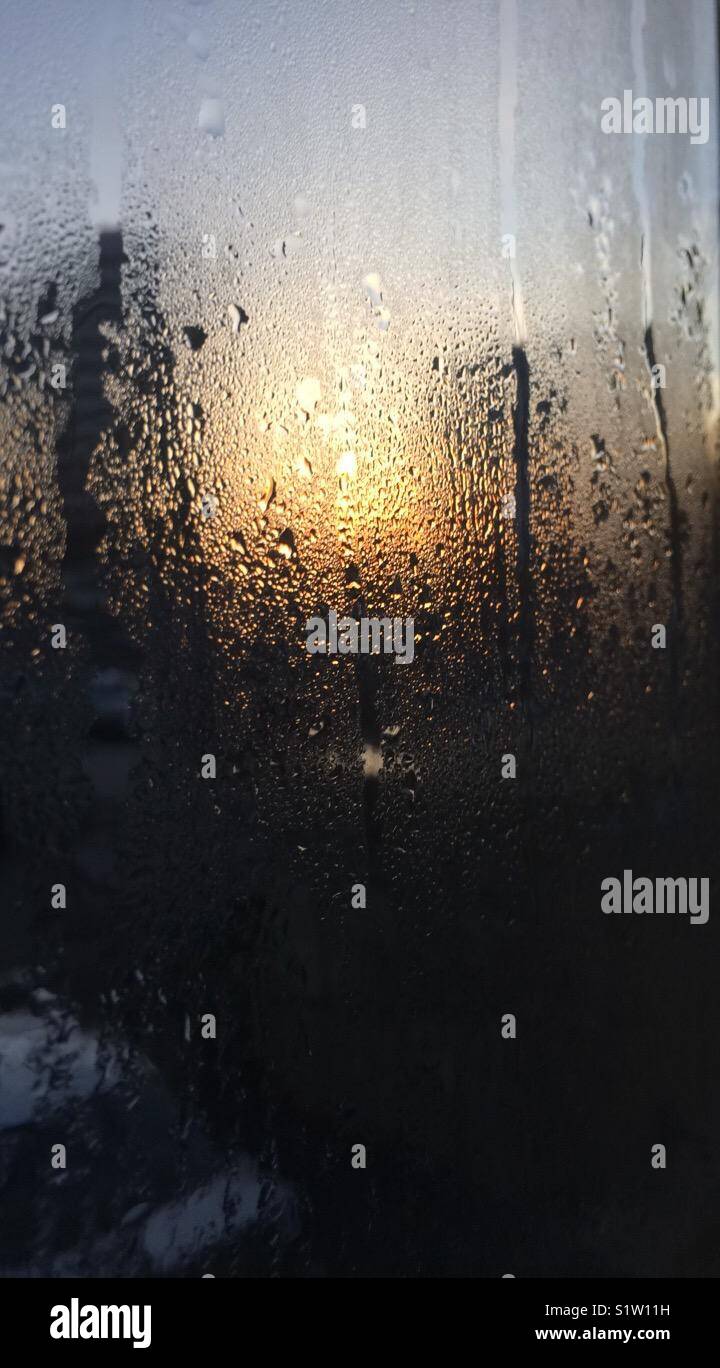 Sunset through a rainy window Stock Photo - Alamy