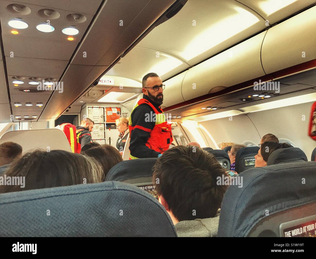 Boarding passengers on board aircraft smartphone stock photos and ...