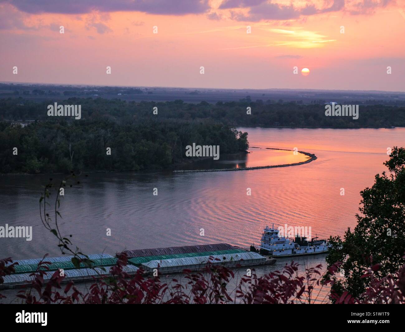 A beautiful view of a sunset over a river from the bluffs Stock Photo ...