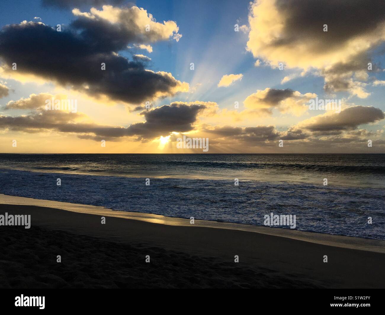 Sunbeams and sunset Stock Photo - Alamy
