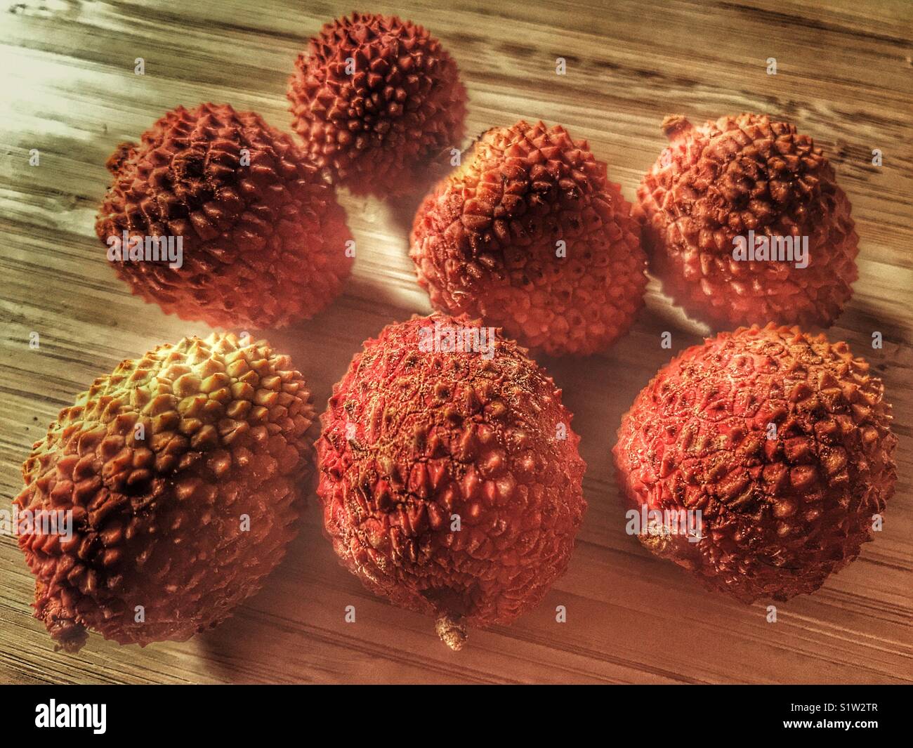 Fresh lychees on a bamboo board Stock Photo - Alamy