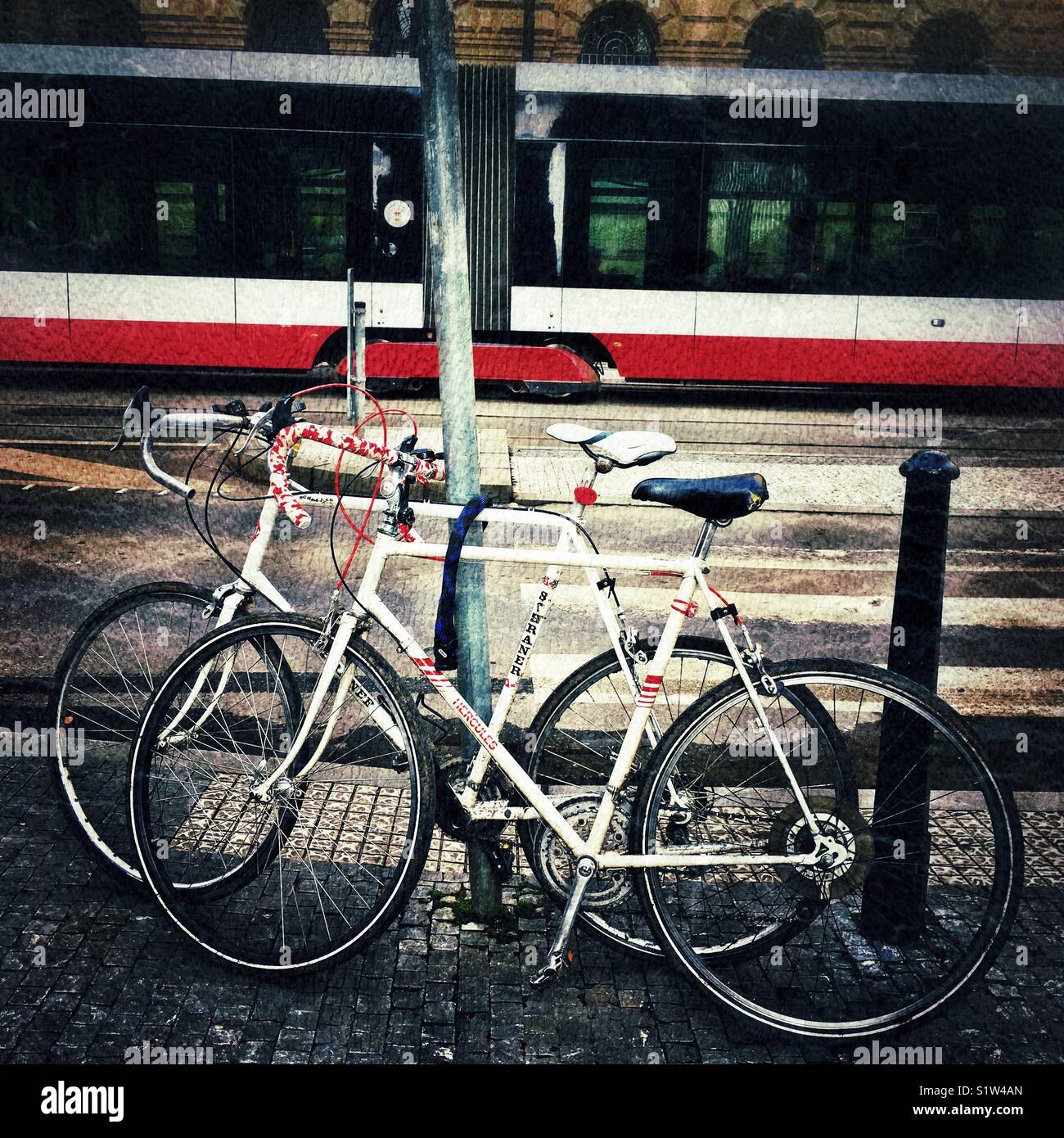 Two bicycles on the street Stock Photo - Alamy