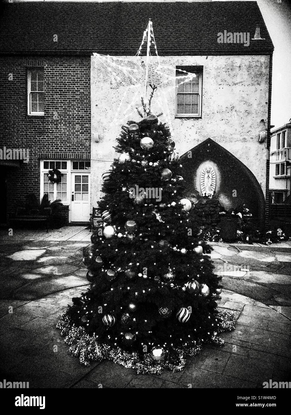 The Christmas tree and Mother Mary Stock Photo - Alamy