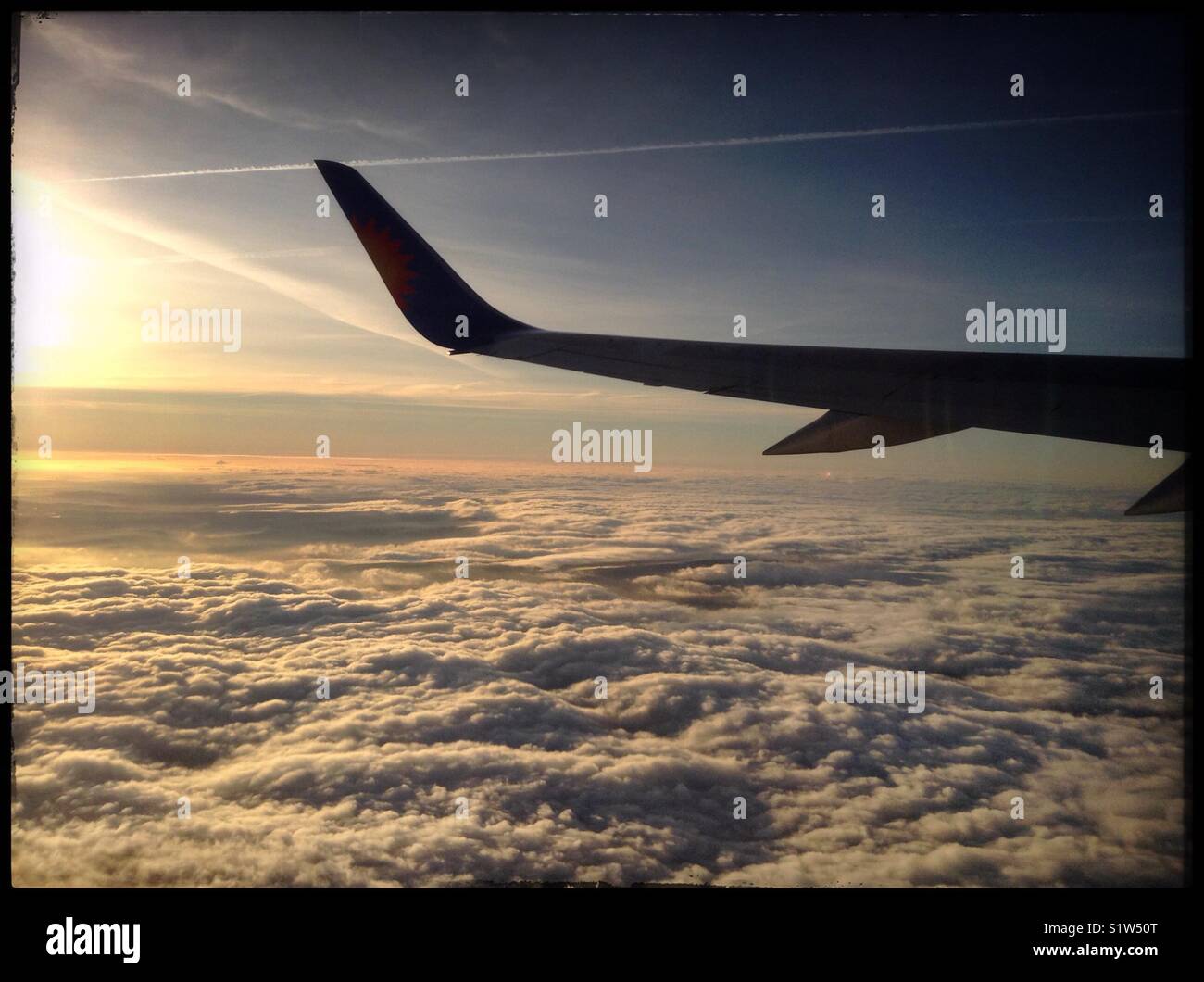 Sunrise above the clouds as seen from a Jet2 flight en-route to Spain ...